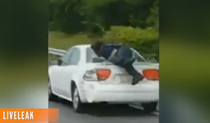 Man Rides on Trunk of Car in the Middle of the Highway (Video) | The ...