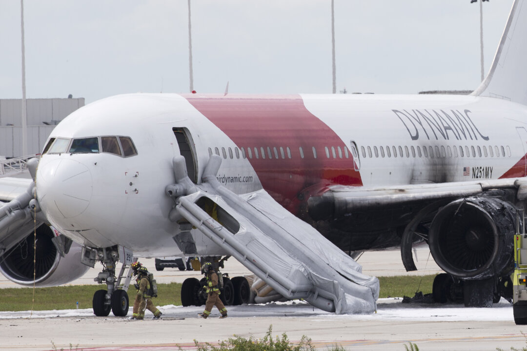 Plane Catches Fire at Airport; Passengers Evacuate on Slides | The ...