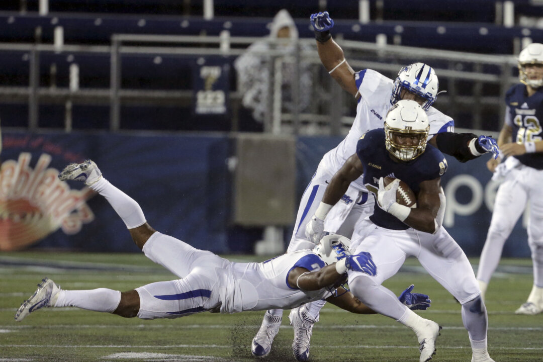 Police: Girlfriend attacks FIU player with boiling water | The Epoch Times