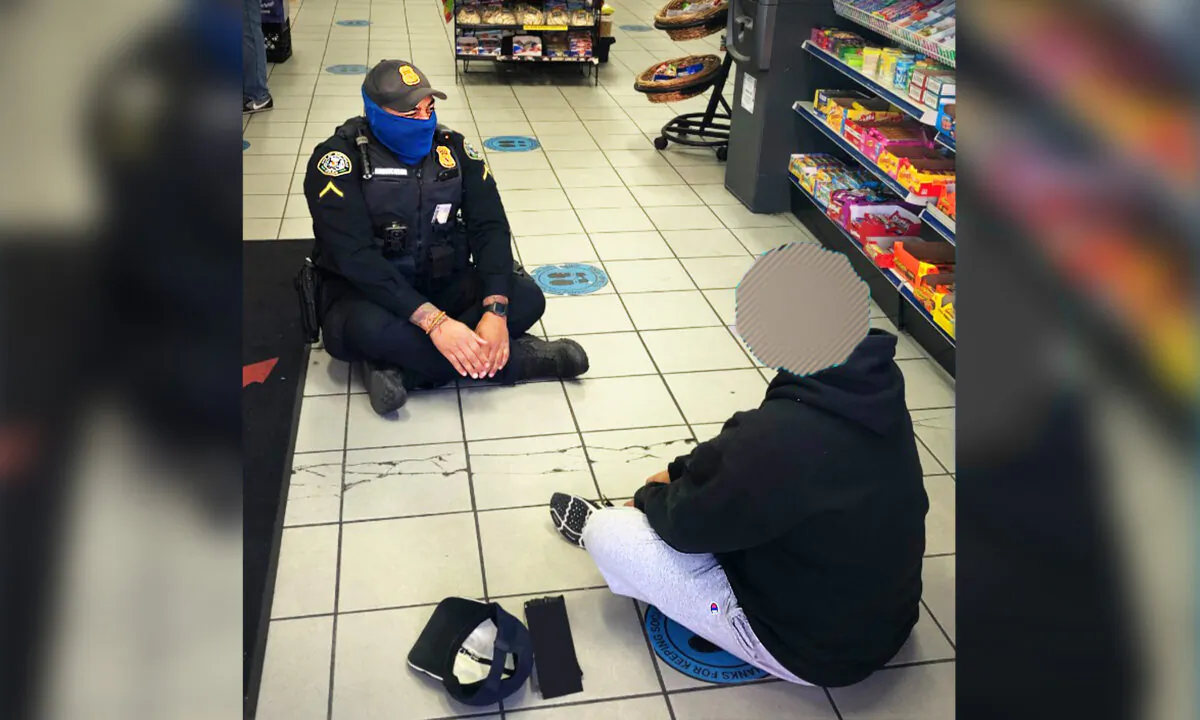 Photo Shows Kind Police Officer Sitting on Floor With Man in Mental ...