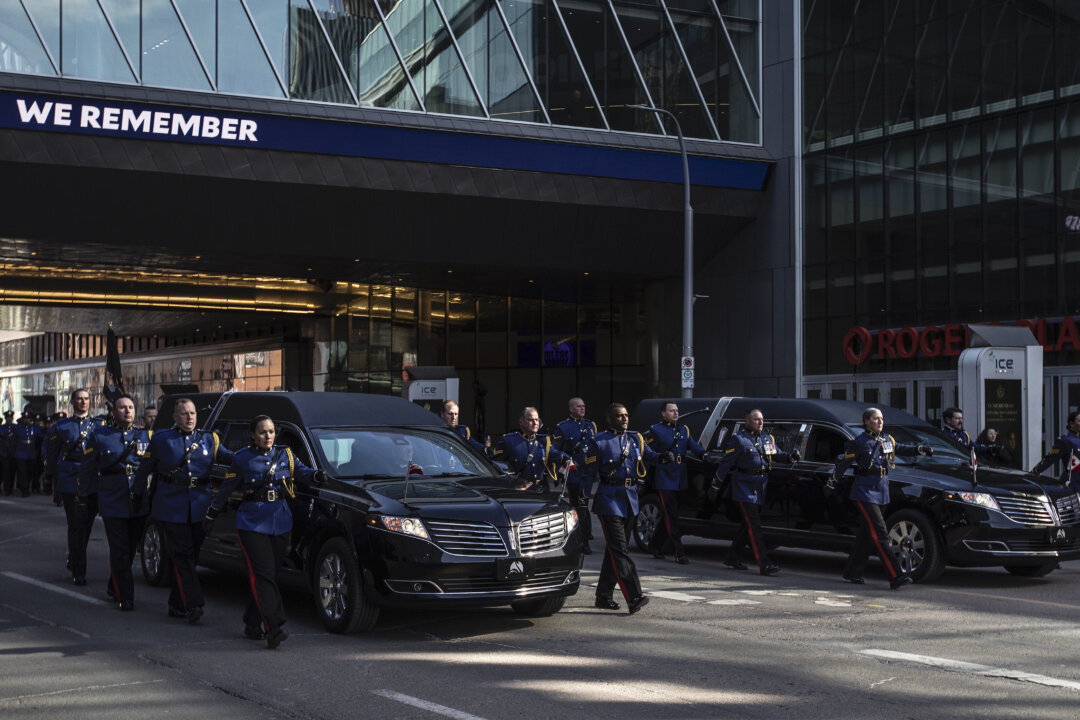 Thousands of Officers March in Funeral Procession for Two Edmonton ...