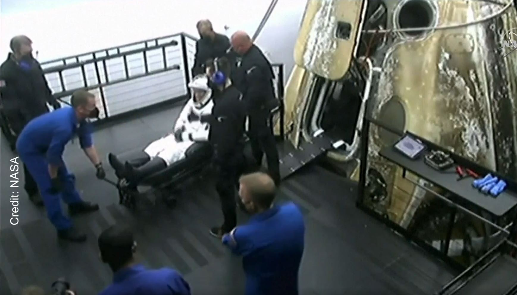 Astronauts Leave Capsule After Returning From International Space