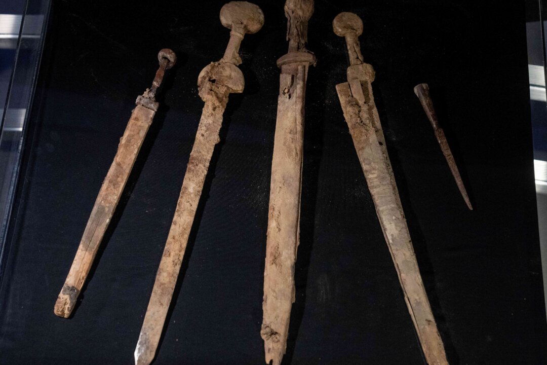 4 Exceptionally Preserved Roman Swords Discovered in a Dead Sea Cave in ...