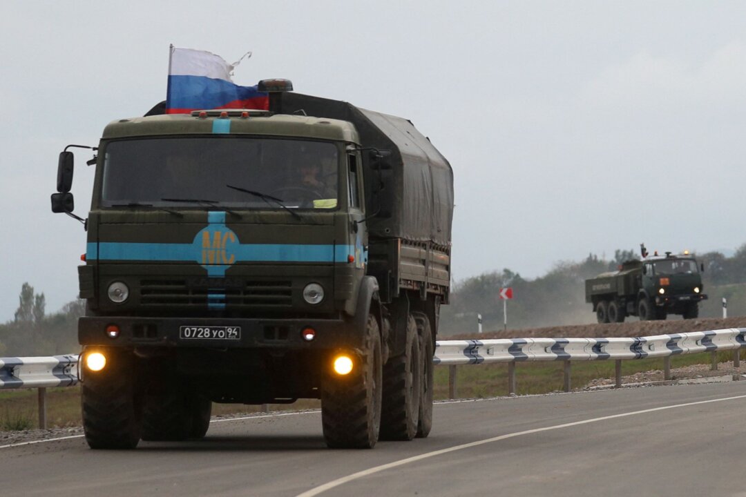 Russia Says Karabakh Armenian Fighters Start Giving Up Arms | The Epoch ...