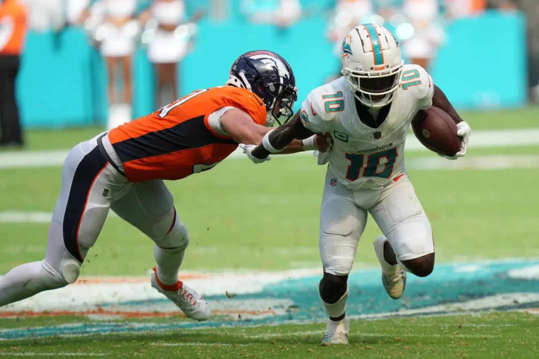 NFL Roundup: Dolphins Score 70 Points in Routing Broncos | The Epoch Times