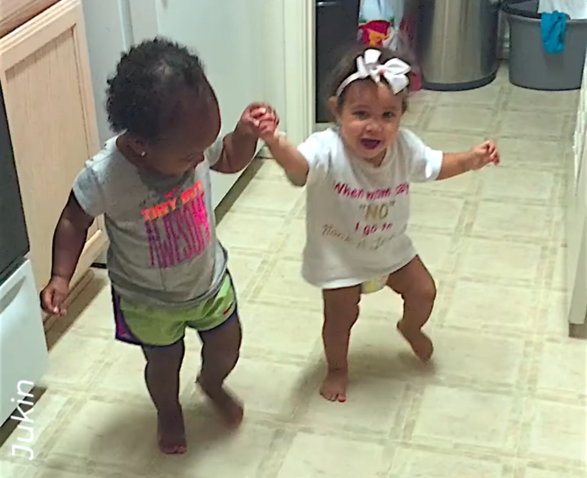 Toddler Helps Baby Cousin to Walk and Dance | EpochTV