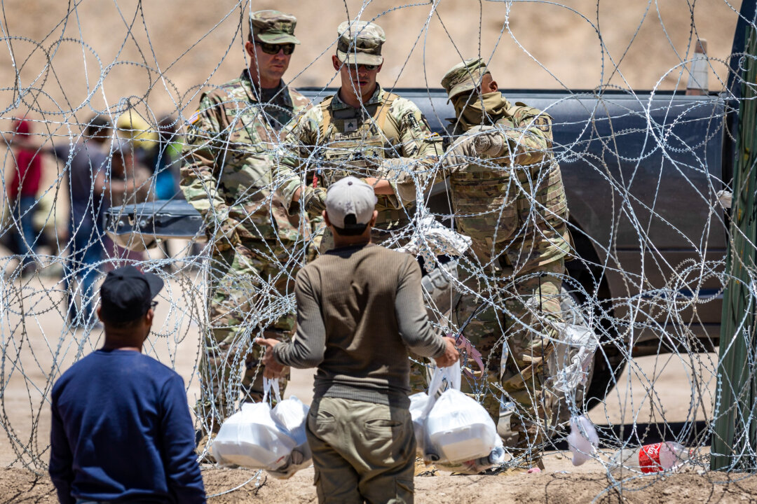 ICE to Deport 215 Illegal Immigrants Involved in Riot at Border Wall in ...