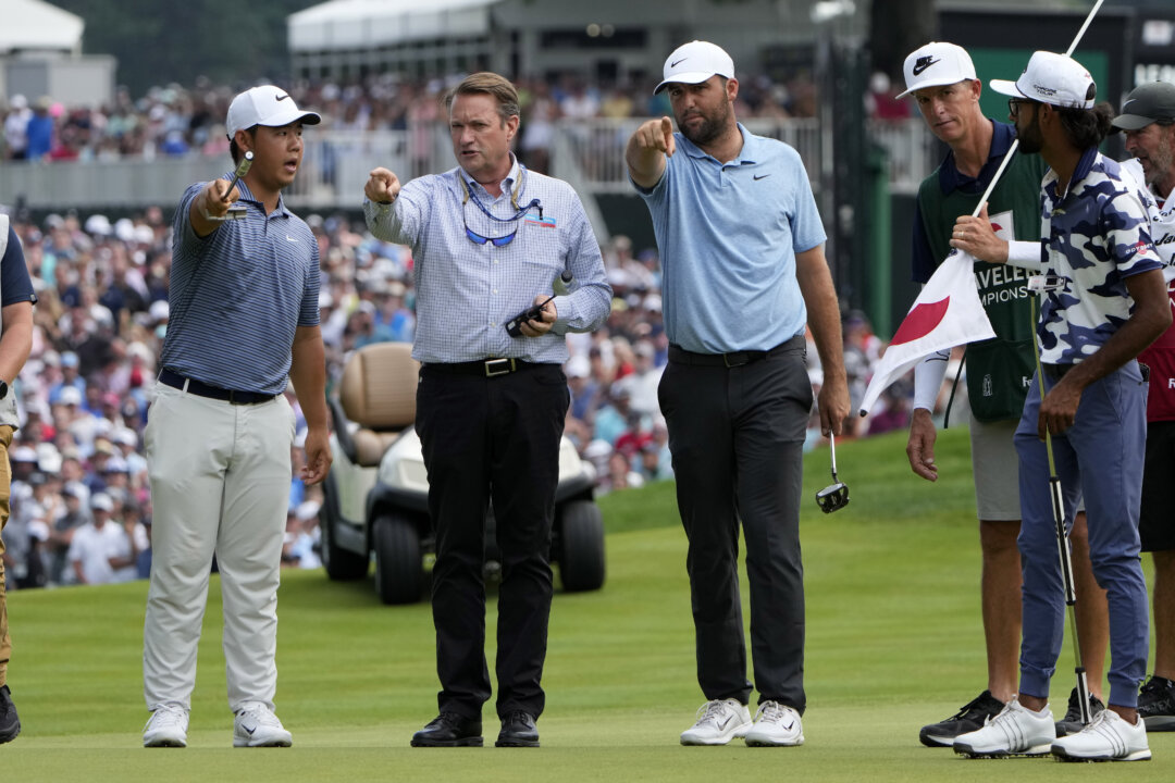 Scheffler Outlasts Kim, Protest on 18th Green to Win Travelers for ...
