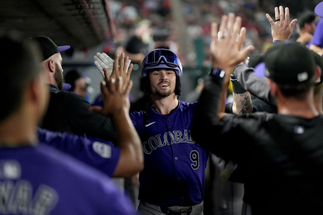 Doyle Wraps up Impressive July With Go-Ahead Homer as Rockies Edge ...