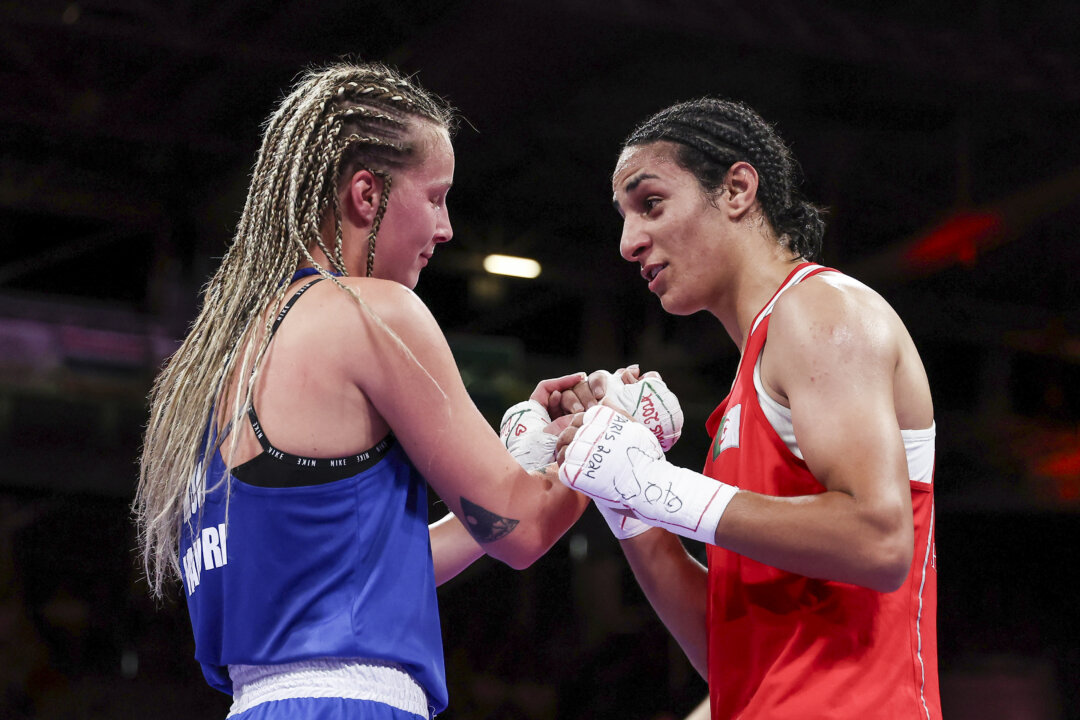 Algerian Boxer at Center of Gender Row Clinches Olympic Medal After ...
