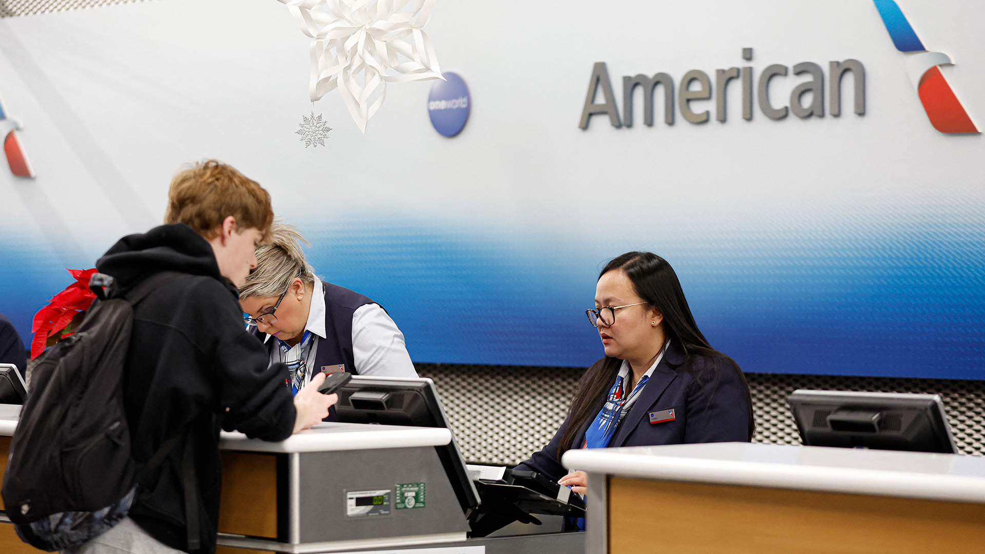 American Airlines Lifts Ground Stop; Hundreds Protest in Syria Over ...