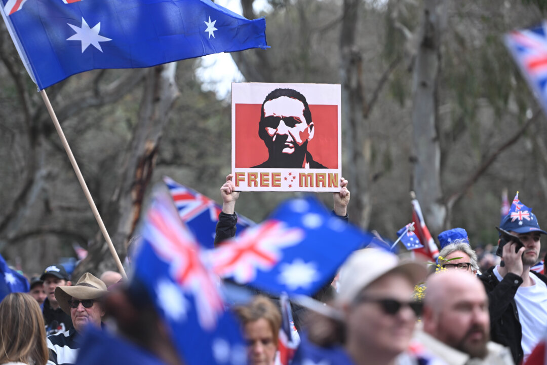 Man Arrested Over ‘Offensive’ Placard at Immigration Rally | The Epoch ...