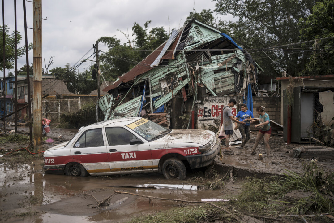 Nearly 40 Dead After Torrential Rain Causes Flooding, Landslides in ...