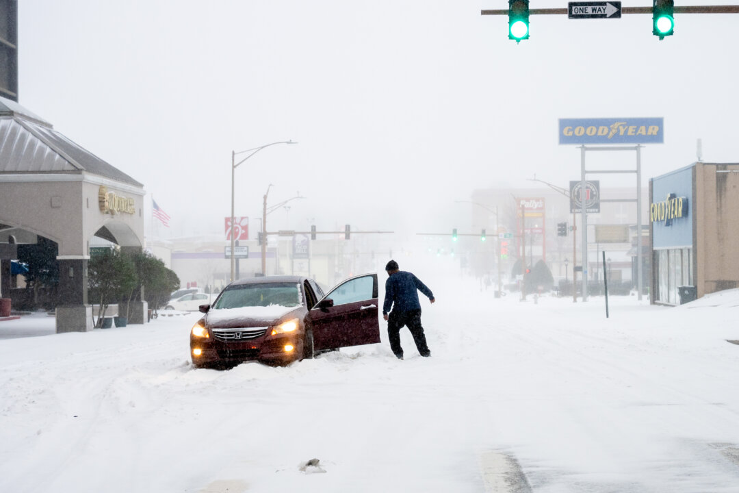 Day in Photos: Winter Storm in US, Landslide in New Zealand, and Tunnel ...