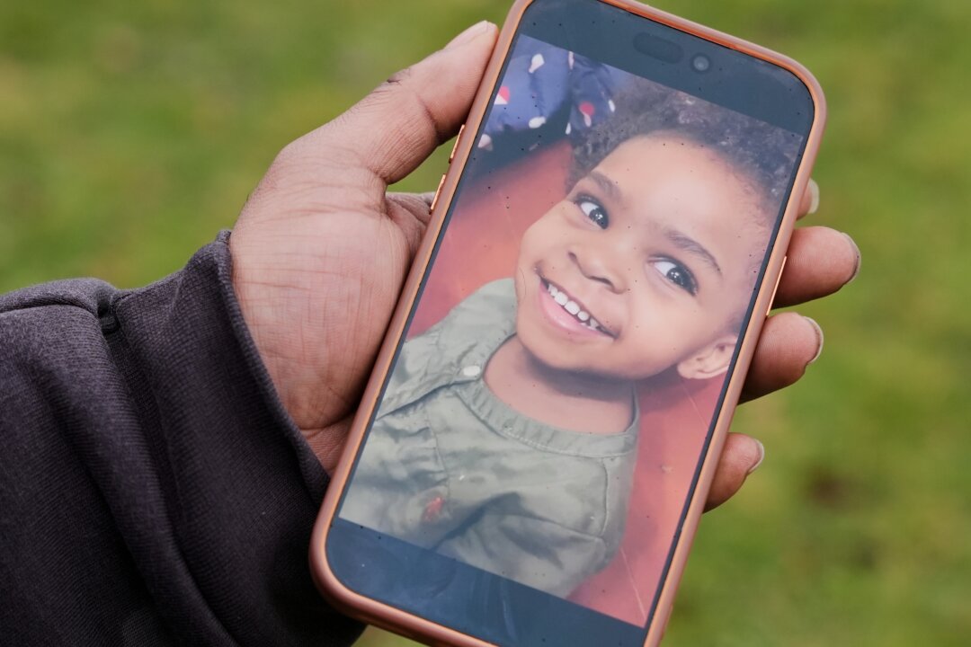 Mother of 2 Girls Found in Shallow Graves in Cleveland Charged With ...