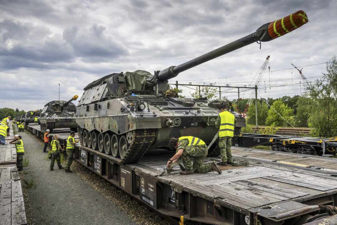 Day in Photos: Fighter Lion Tanks, Factory Explosion in Malta, and ...